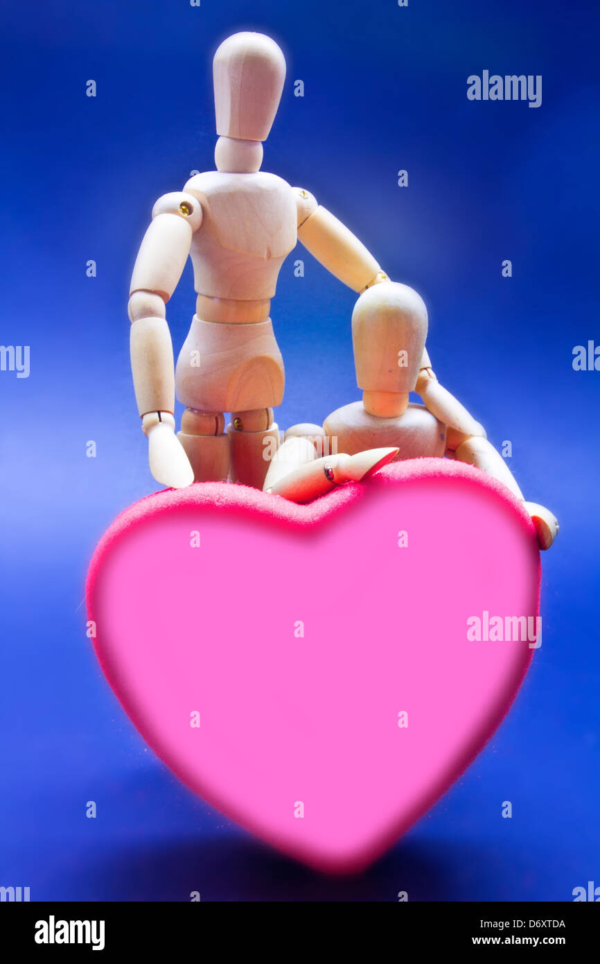 Pair of expressing his love dolls Stock Photo - Alamy