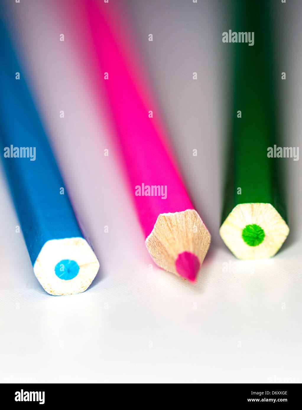 Three coloured pencils Stock Photo - Alamy