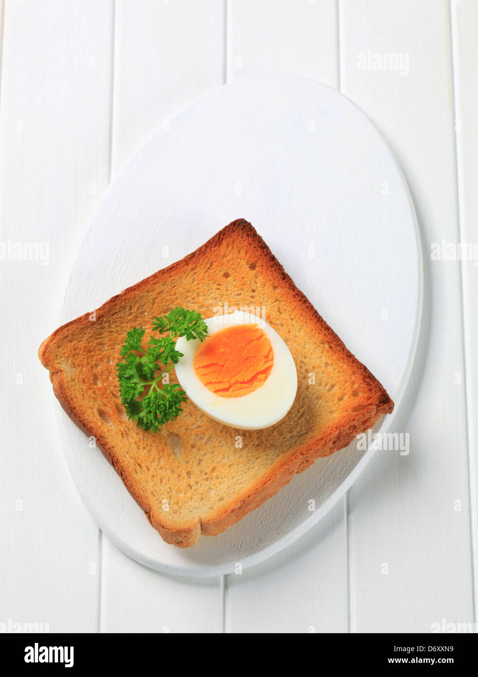 Slice of toasted bread and boiled egg Stock Photo - Alamy