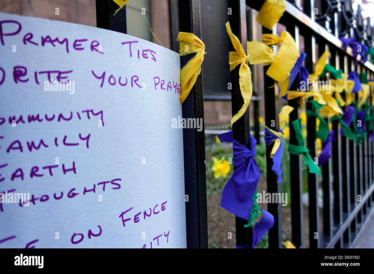 Prayer ribbons tied to fence in remembrance of Boston Marathon bomb ...