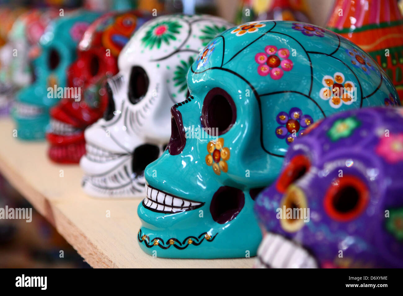 Colourful Mayan ceramic skulls Stock Photo - Alamy