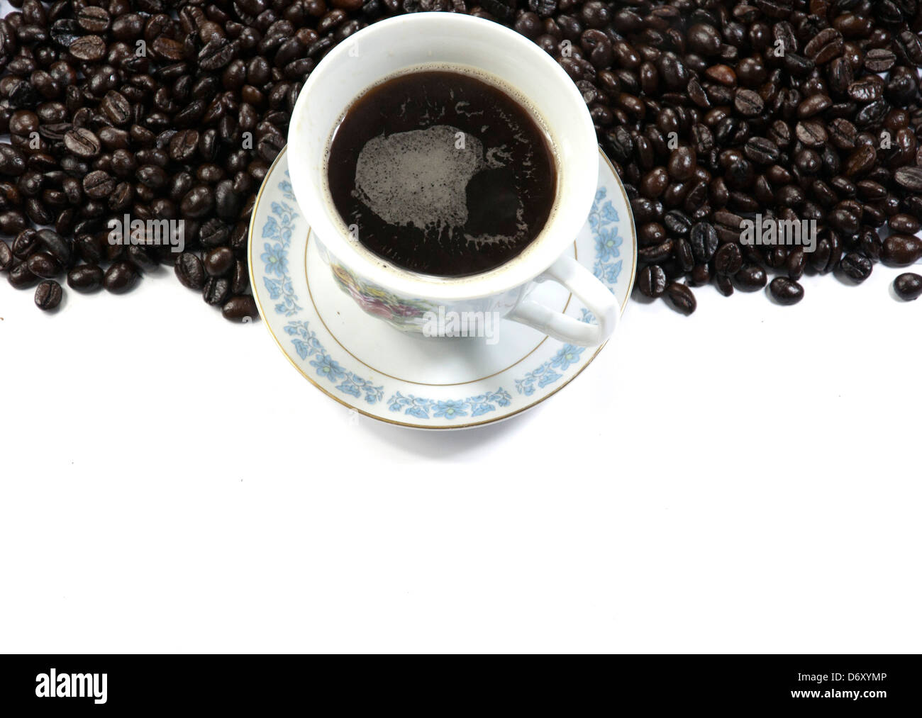 A cup of coffee and coffee beans background Stock Photo - Alamy