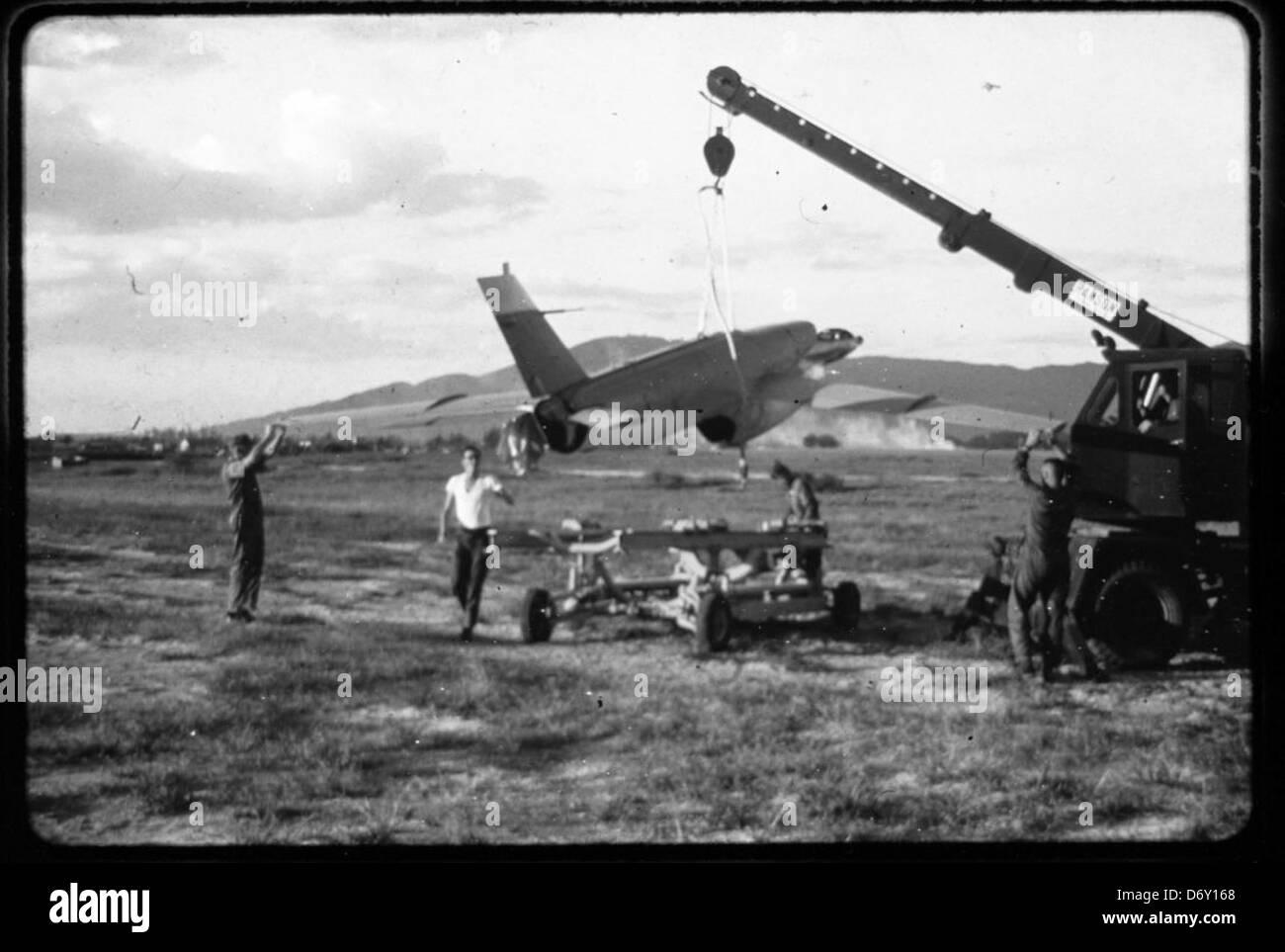 The L-345 147J recovery operation by Ryan Aeronautical, depicted in ...