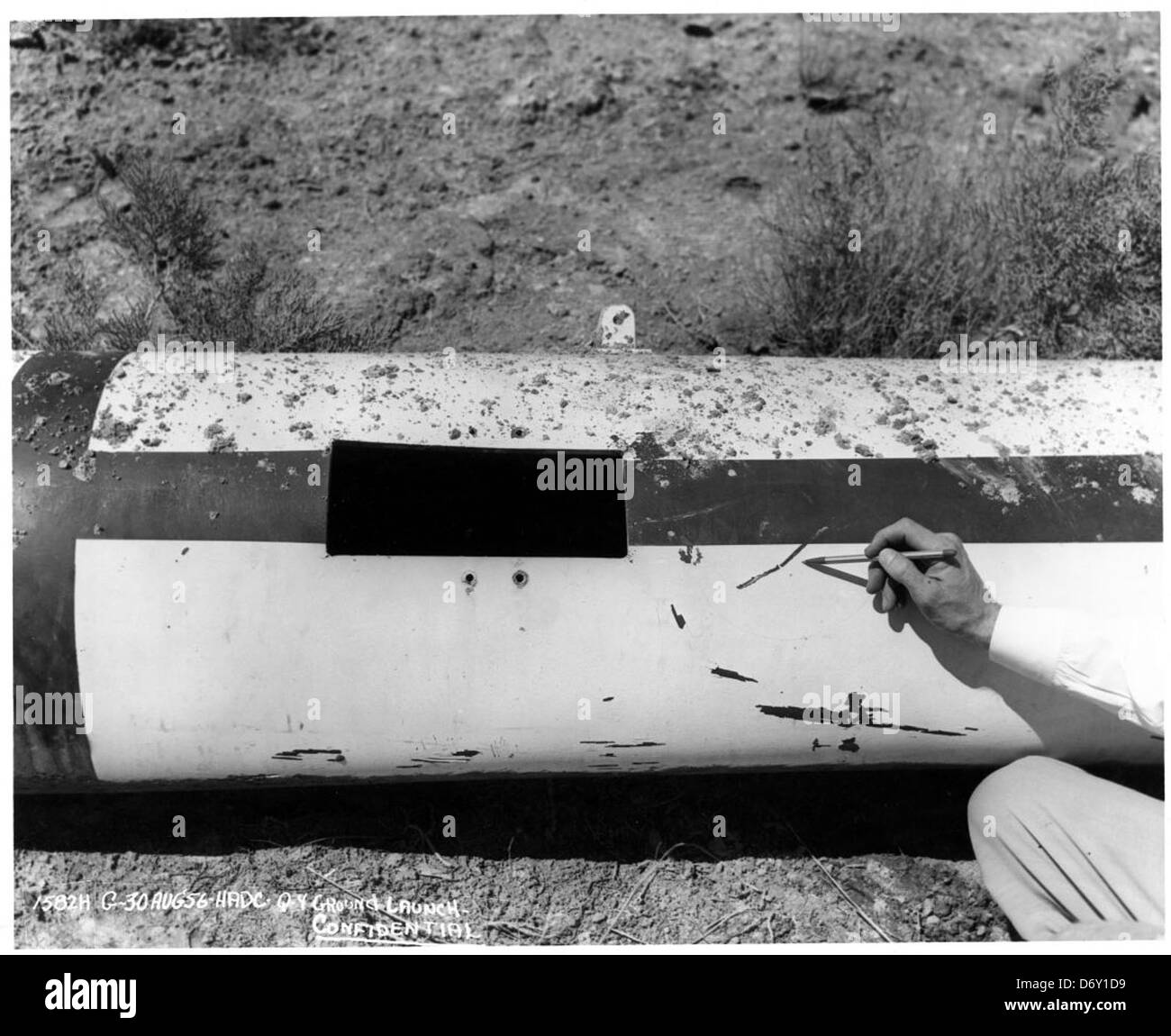 This photograph shows the Q-4 drone ground launch rail test at Holloman ...