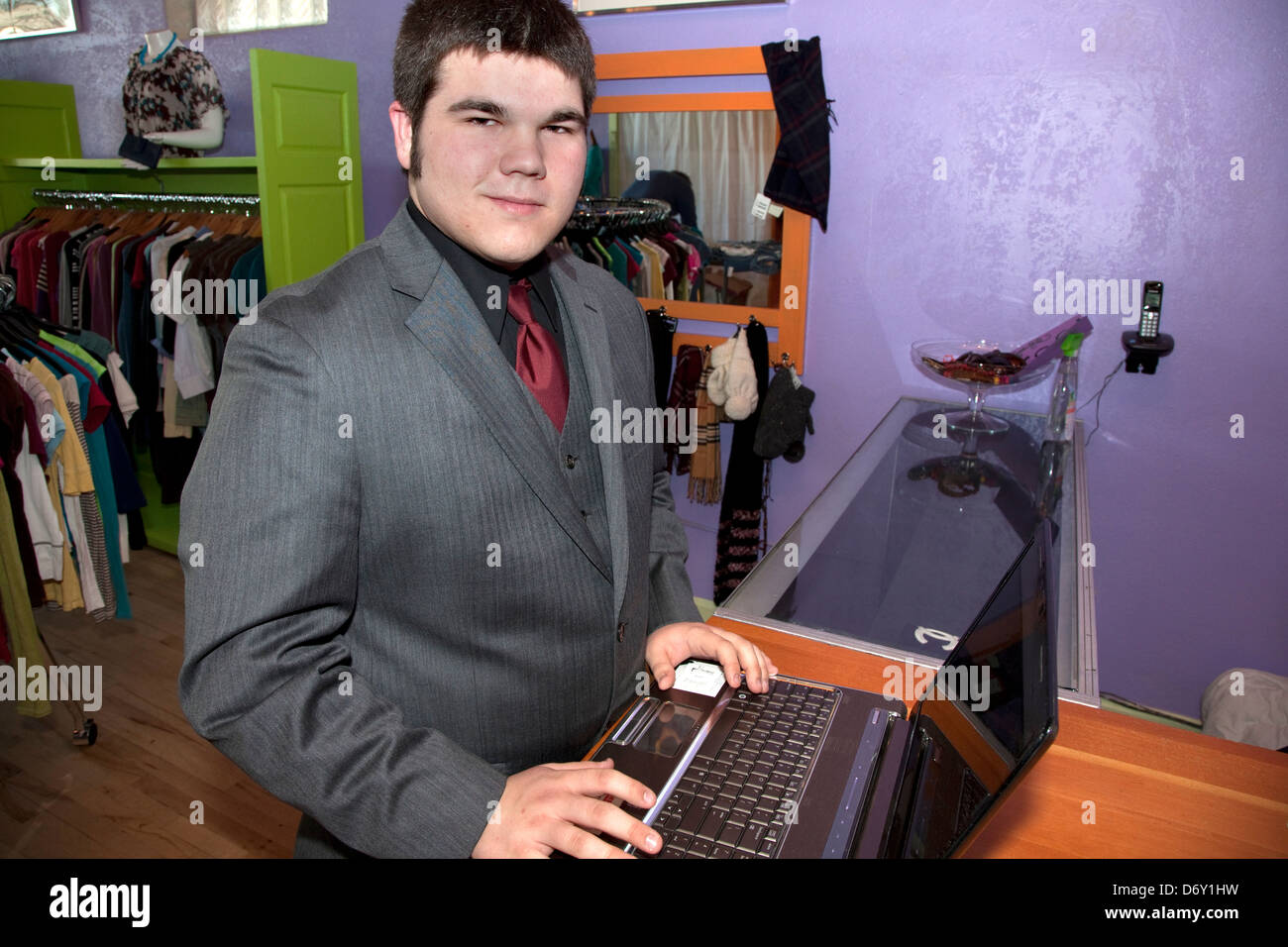 Smart looking teen store manager for the nonprofit Express Yourself ...