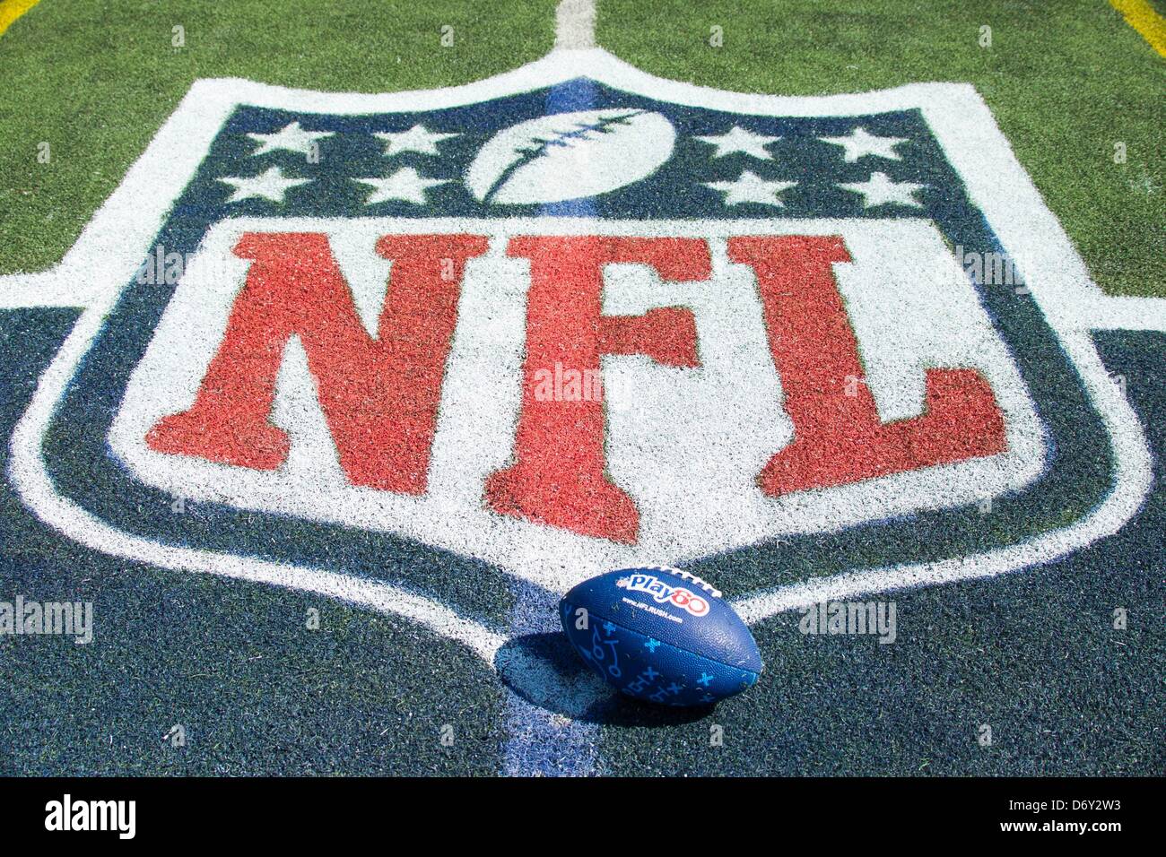 April 24, 2013: The NFL Shield on the field with a Play 60 football by ...