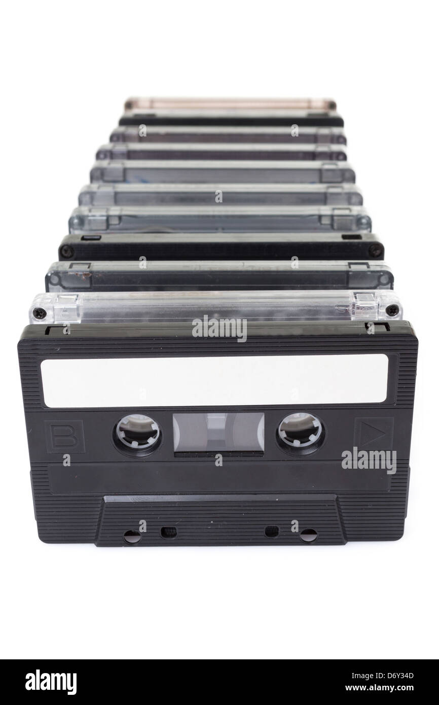 Row of vintage audio tapes over white background Stock Photo - Alamy