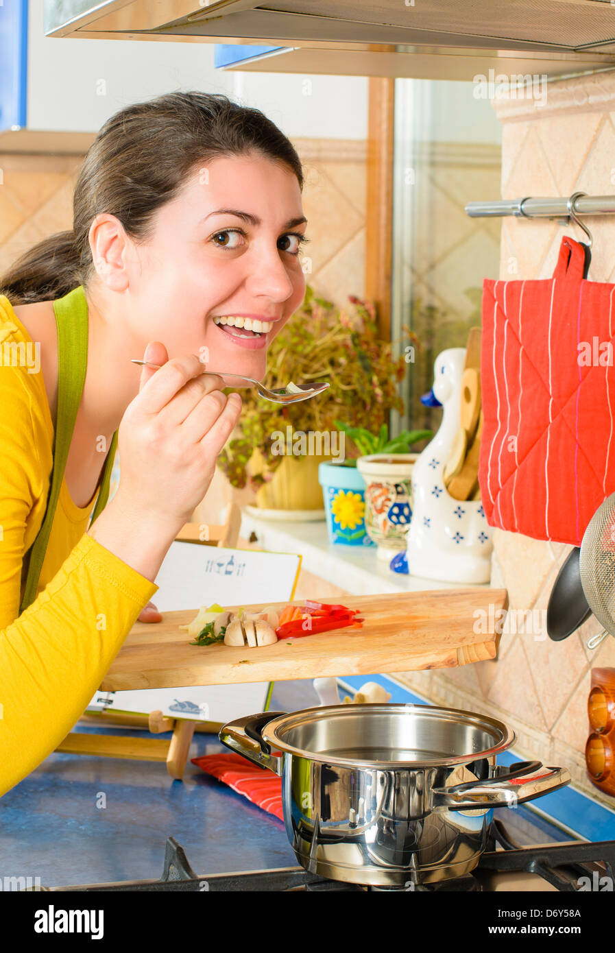Woman cooking soup beautiful hi-res stock photography and images - Alamy