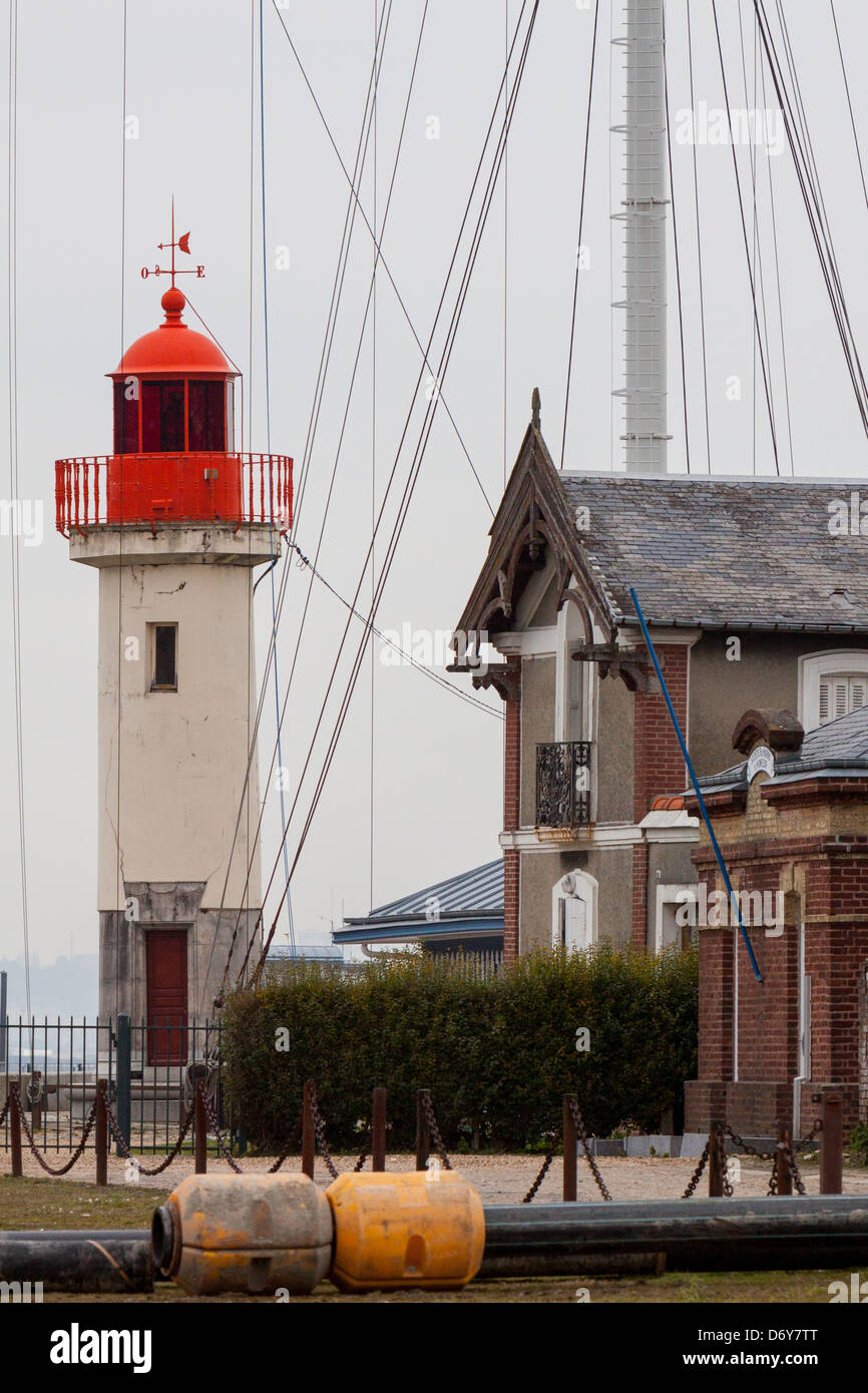 red lighthouse in entrance at honfleur harbour, Normandy, France Stock ...