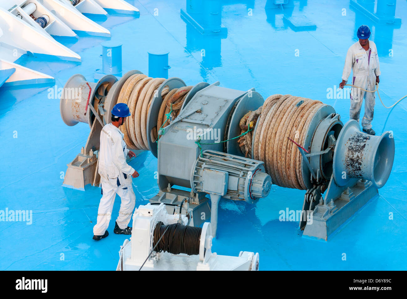 Thomson Destiny; men; working; foredeck; ship; nautical Stock Photo - Alamy