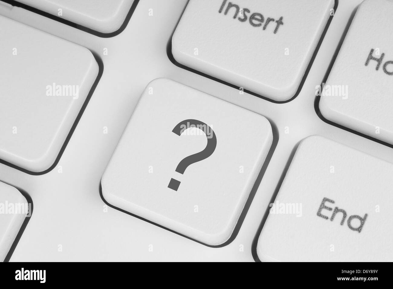 Question button on the keyboard close-up Stock Photo - Alamy
