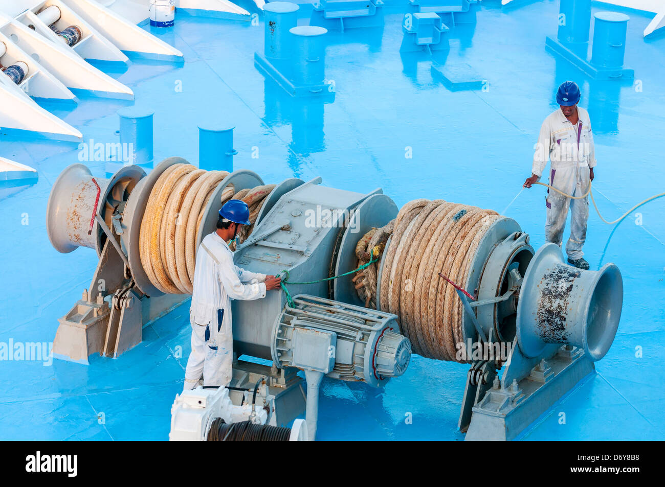 Thomson Destiny; men; working; foredeck; ship; nautical Stock Photo - Alamy
