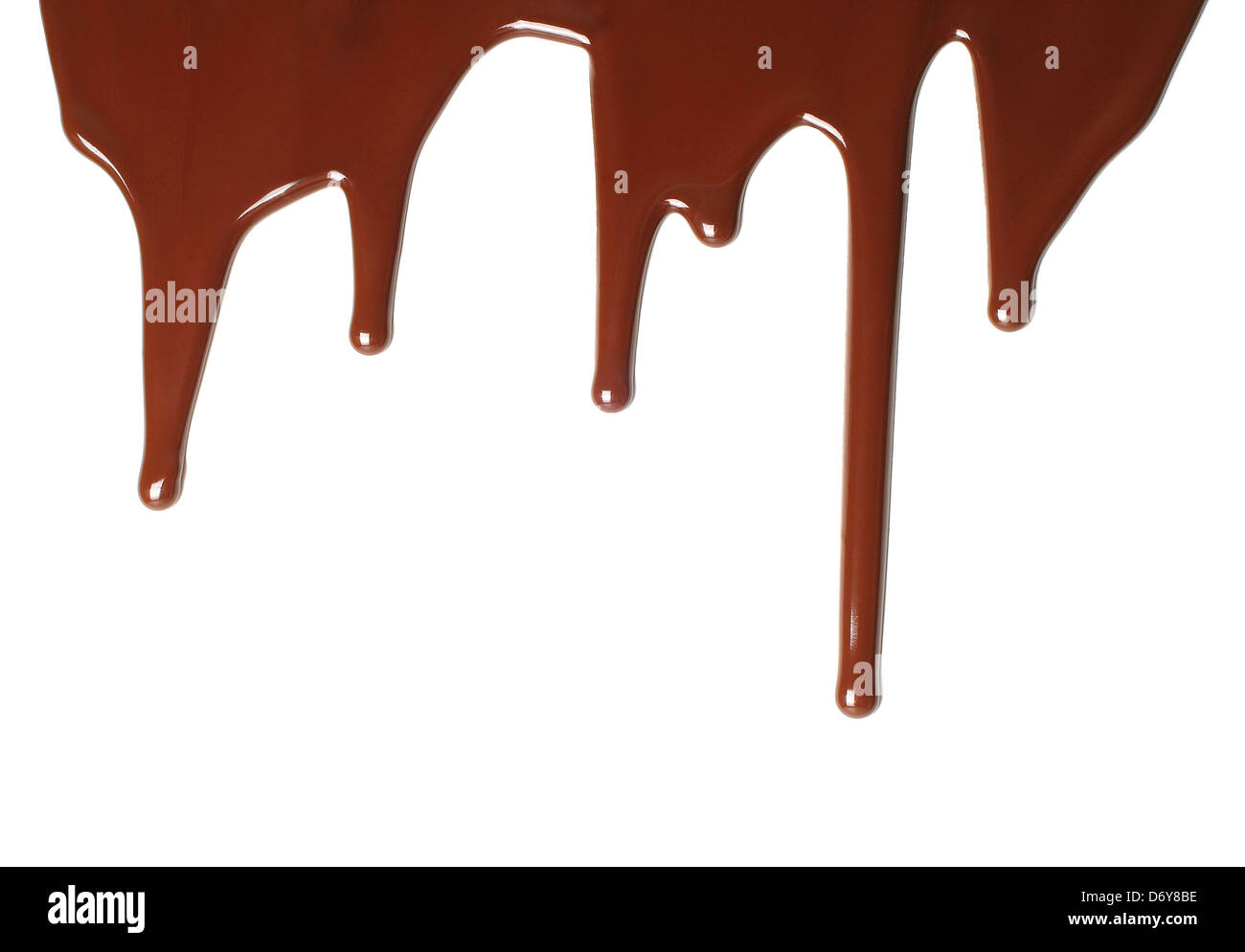 Melted chocolate dripping on white background Stock Photo - Alamy