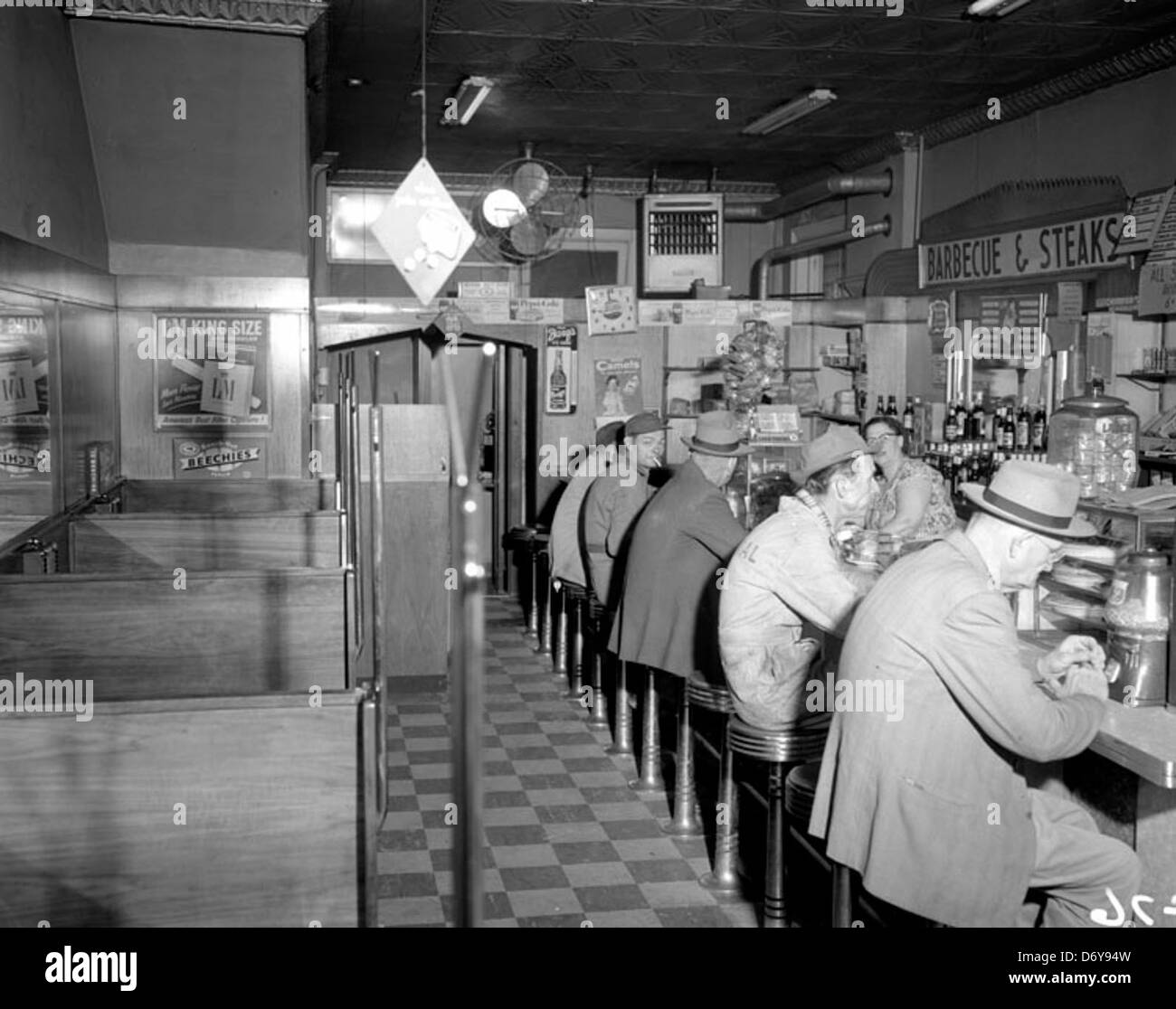A photograph from 1955 shows the interior of Nick's restaurant at 802 ...