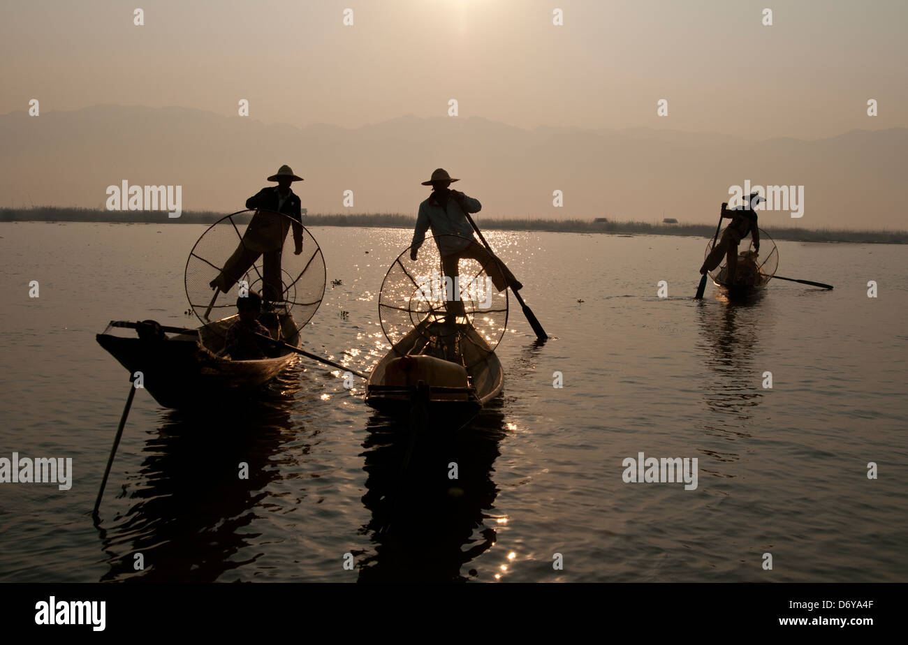 Intha leg rowing fishermen on Inle Lake Myanmar (Burma Stock Photo - Alamy