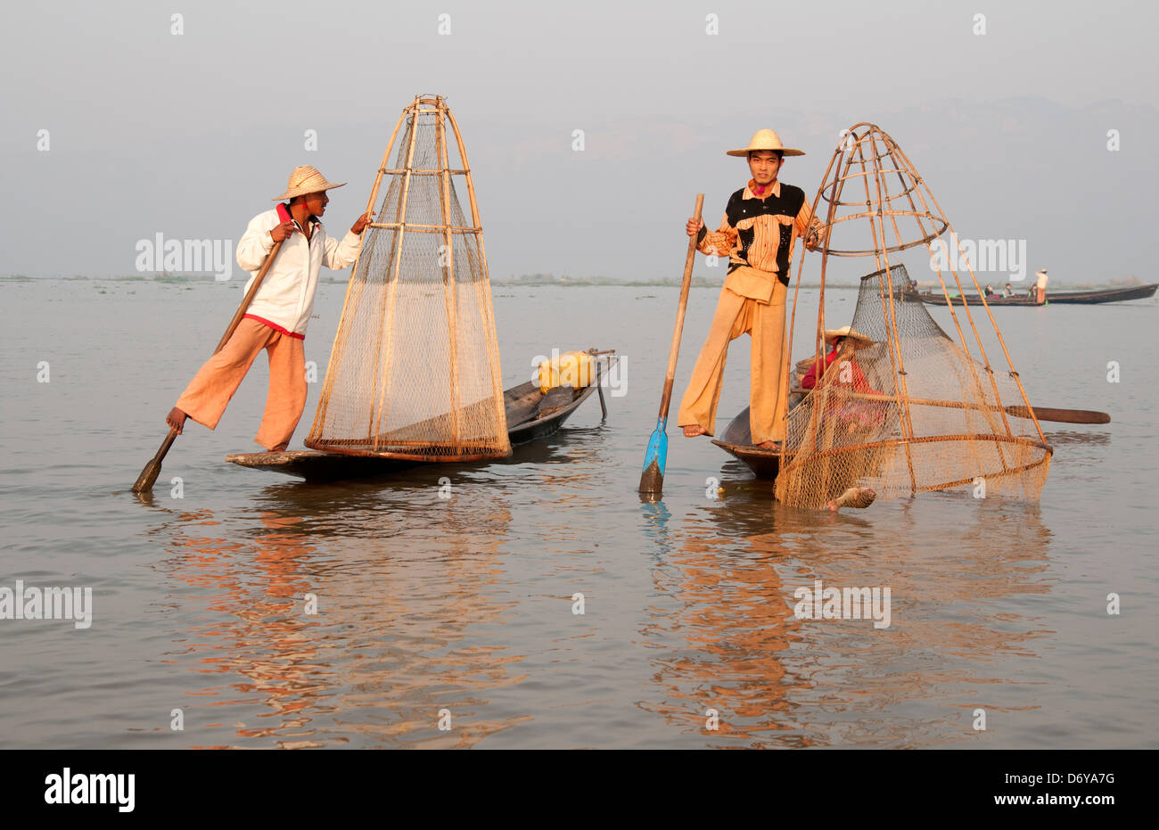 Intha leg rowing fishermen on Inle Lake Myanmar (Burma Stock Photo - Alamy