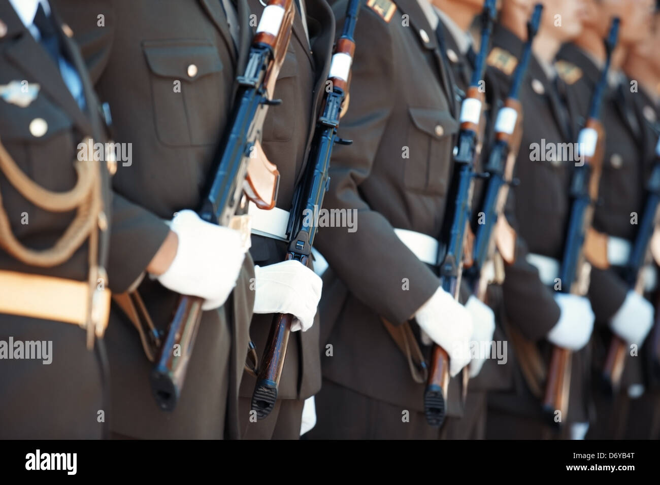 Row of soldiers with Kalashnikov guns Stock Photo - Alamy