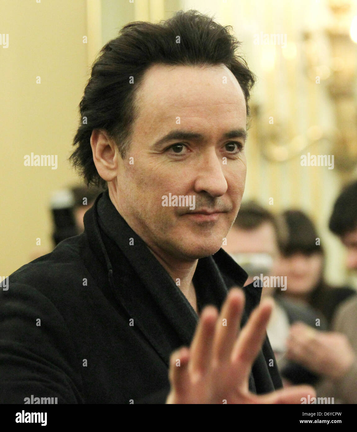 John Cusack attends a press conference for his movie 'The Raven' in ...