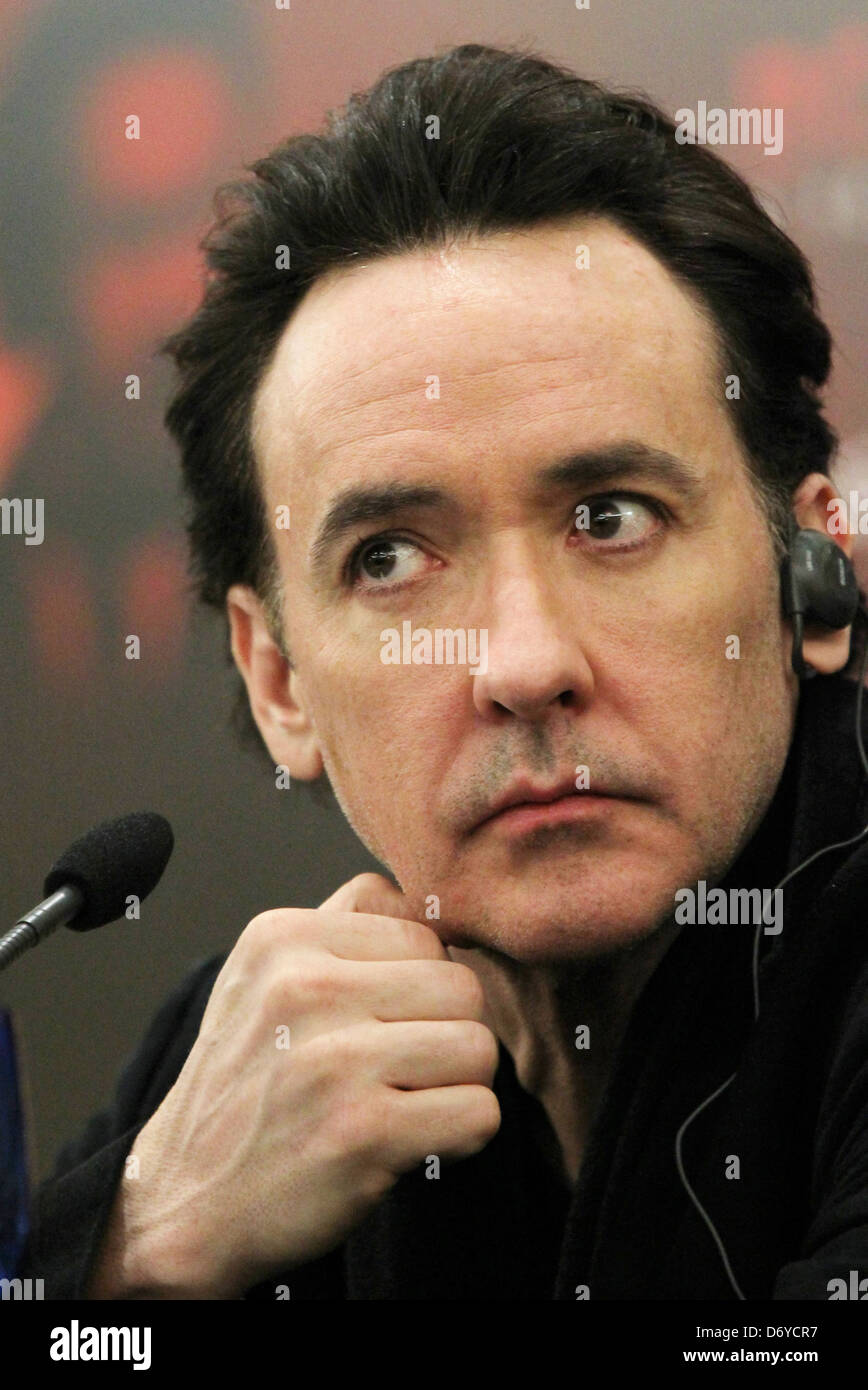 John Cusack attends a press conference for his movie 'The Raven' in ...