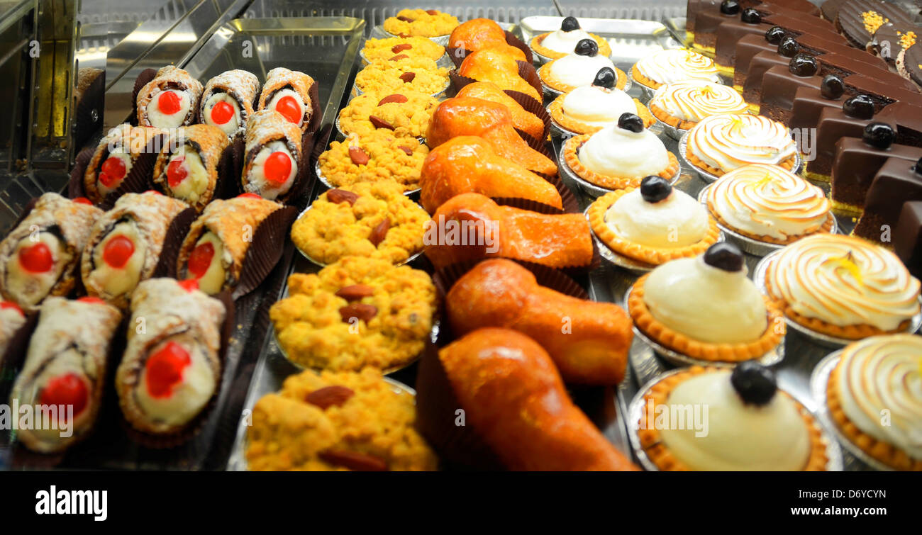 Display case with chilled desserts including canole, Venice, Veneto ...