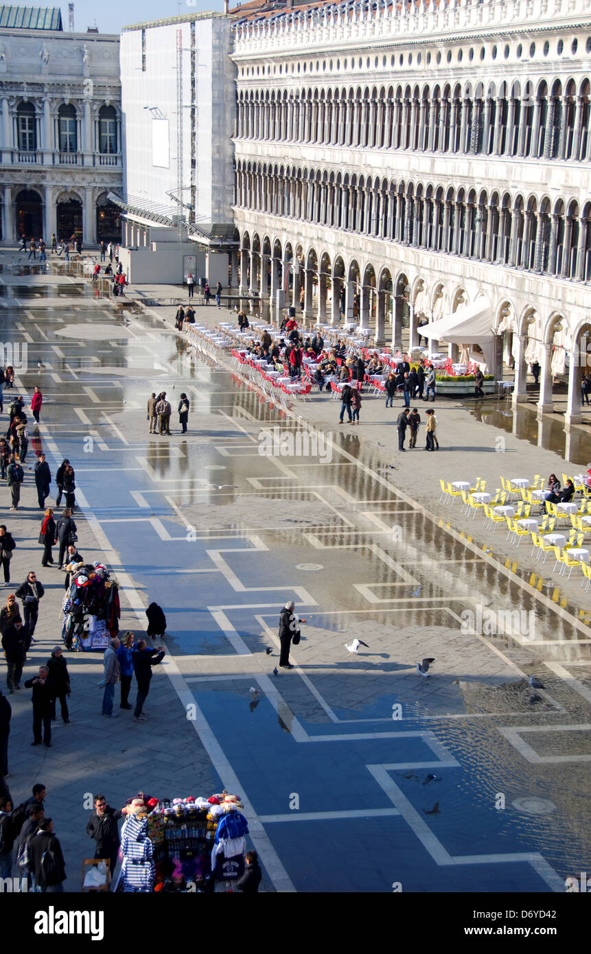 Tourists at a town square, Doges Palace, St. Mark's Square, Venice ...