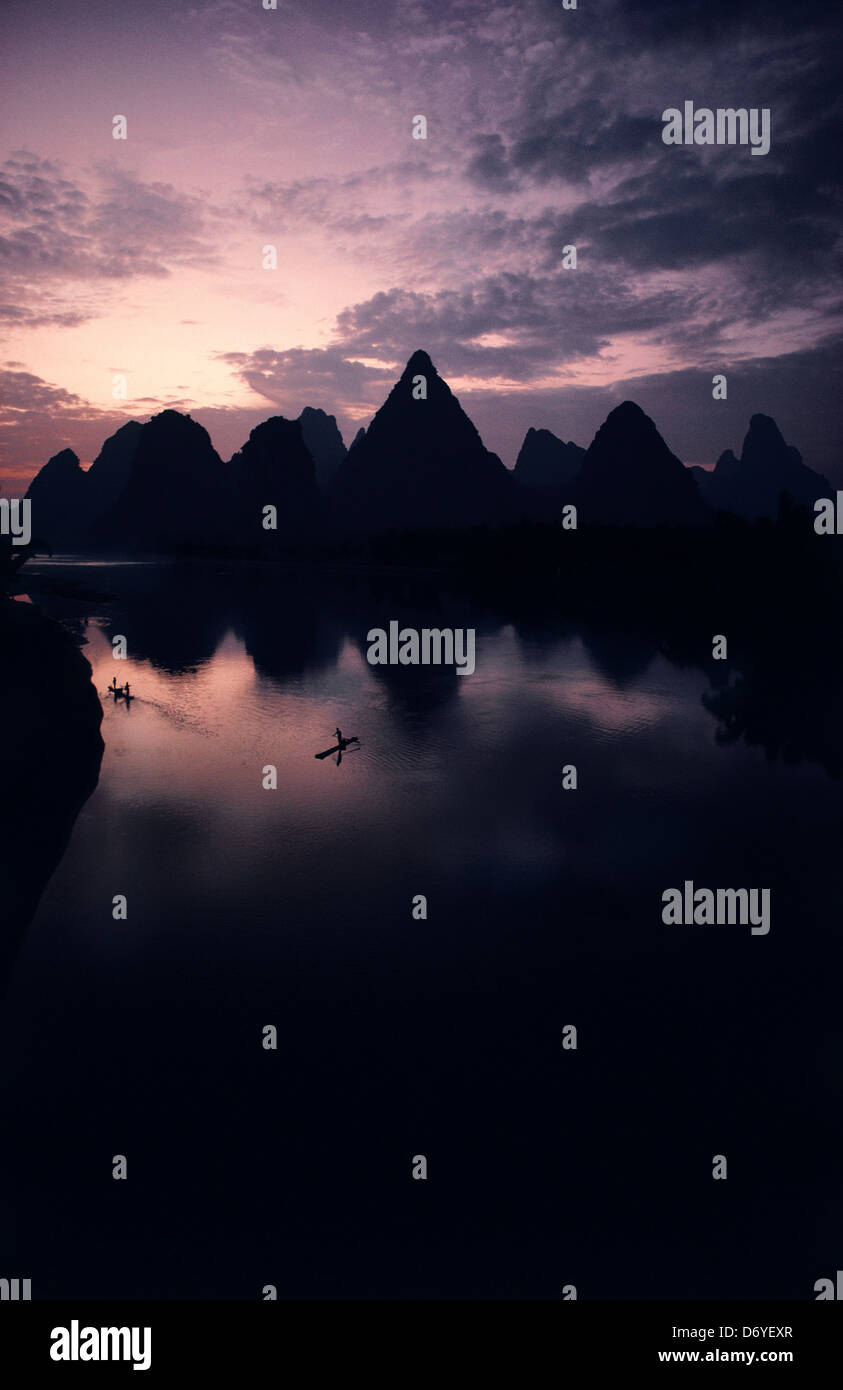 Reflections of mountains in the water, Yangshuo, Guangxi Province ...