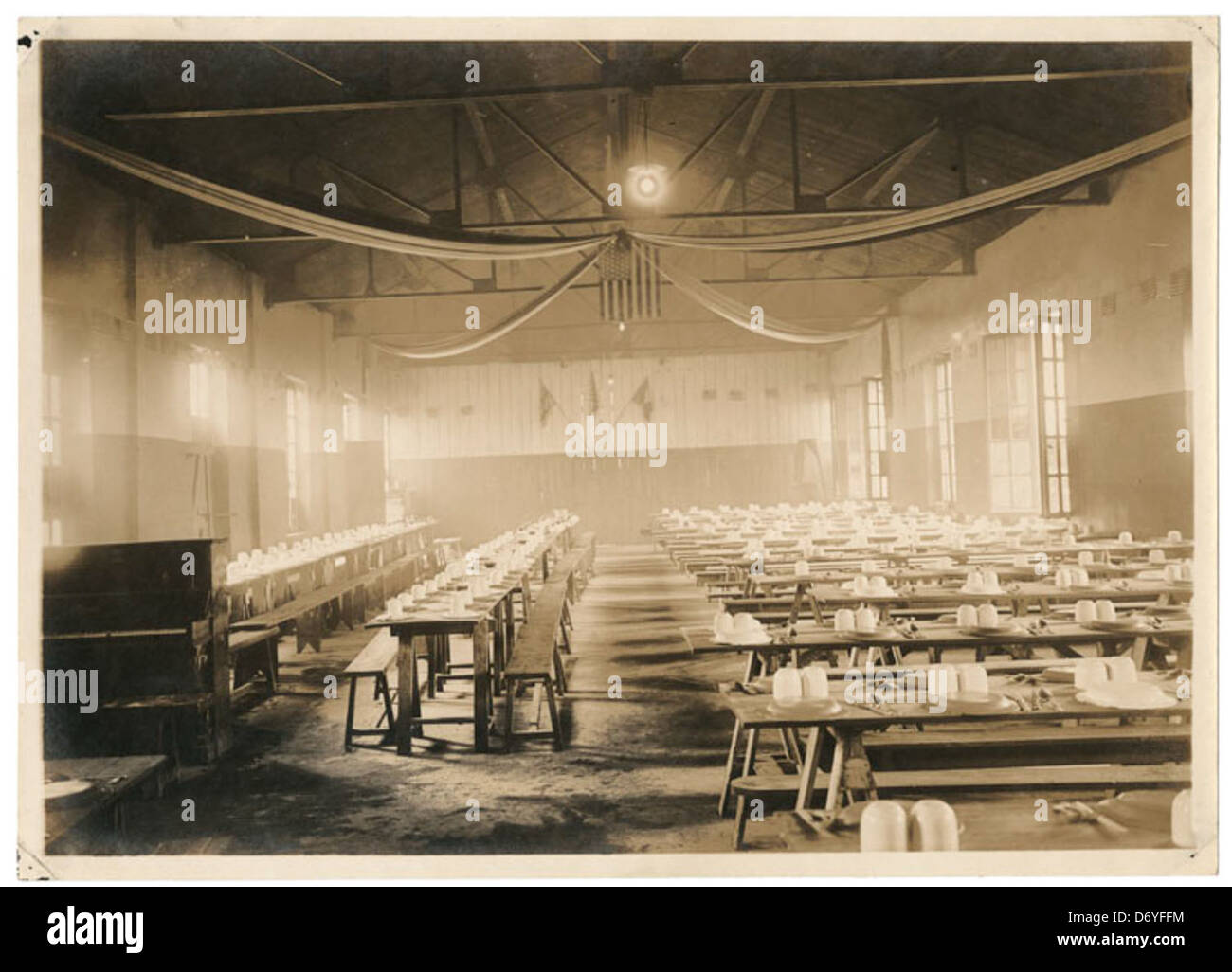 A photograph from World War I showing a men's mess hall kitchen in ...
