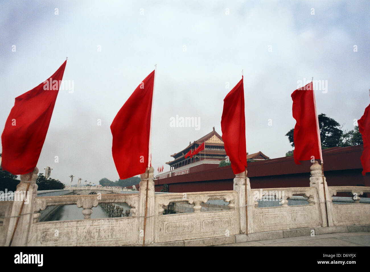 Red flags fluttering on the wall surrounding the Forbidden City ...