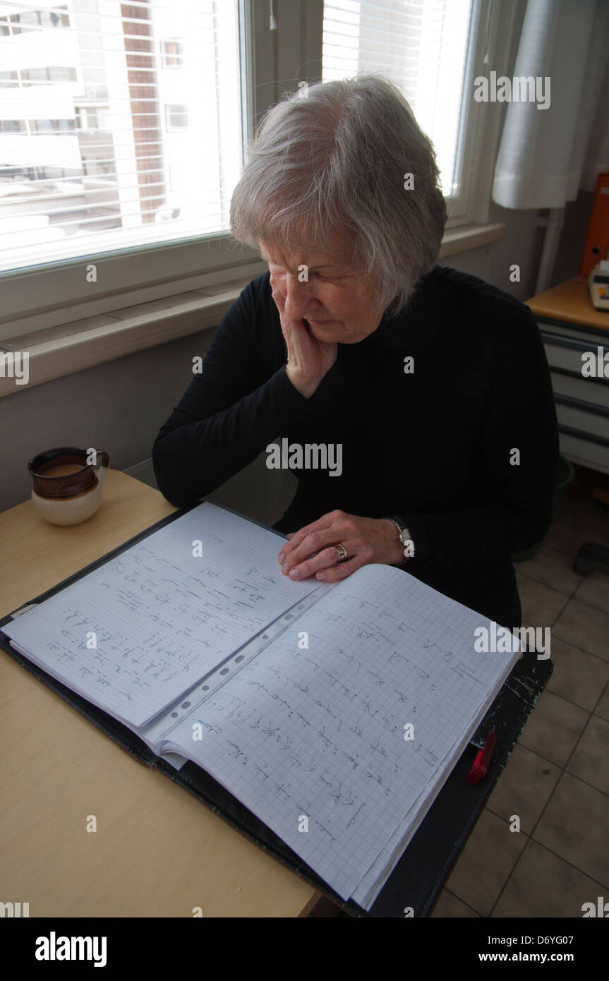 Female in her early 70s doing paperwork Pori Finland Europe Stock Photo ...