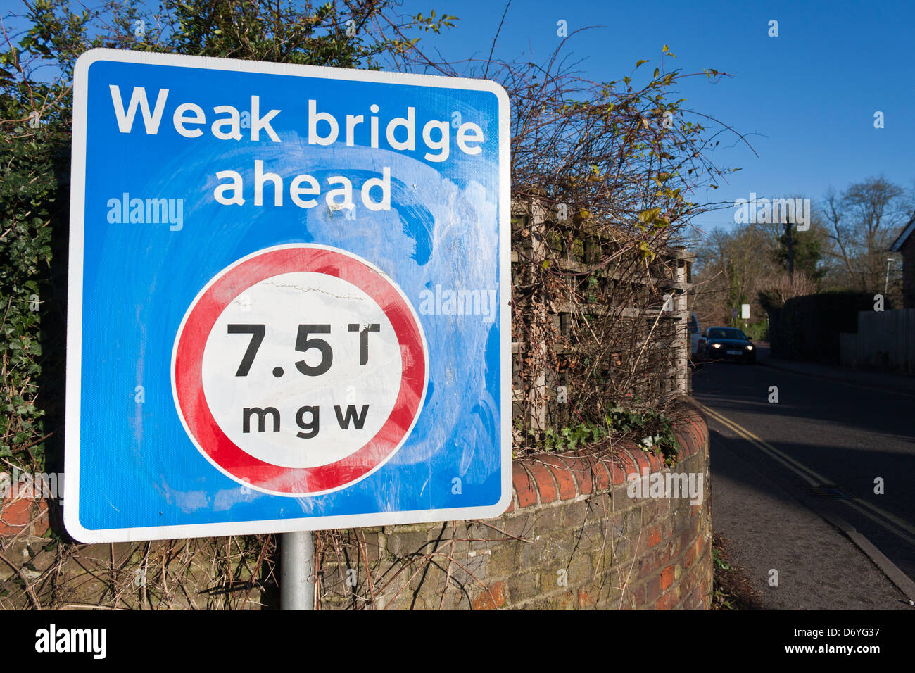 Sign warning of a weak bridge ahead with a weight limit imposed Stock ...