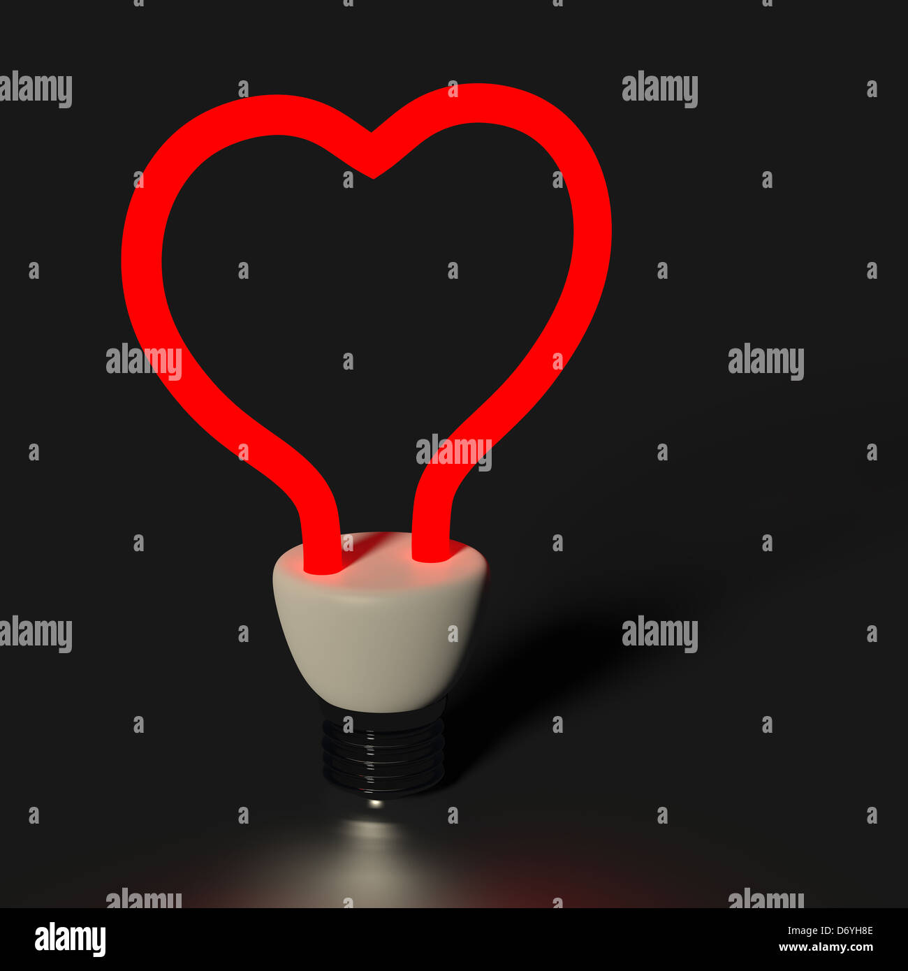 Red heart shaped light bulb isolated on black Stock Photo - Alamy
