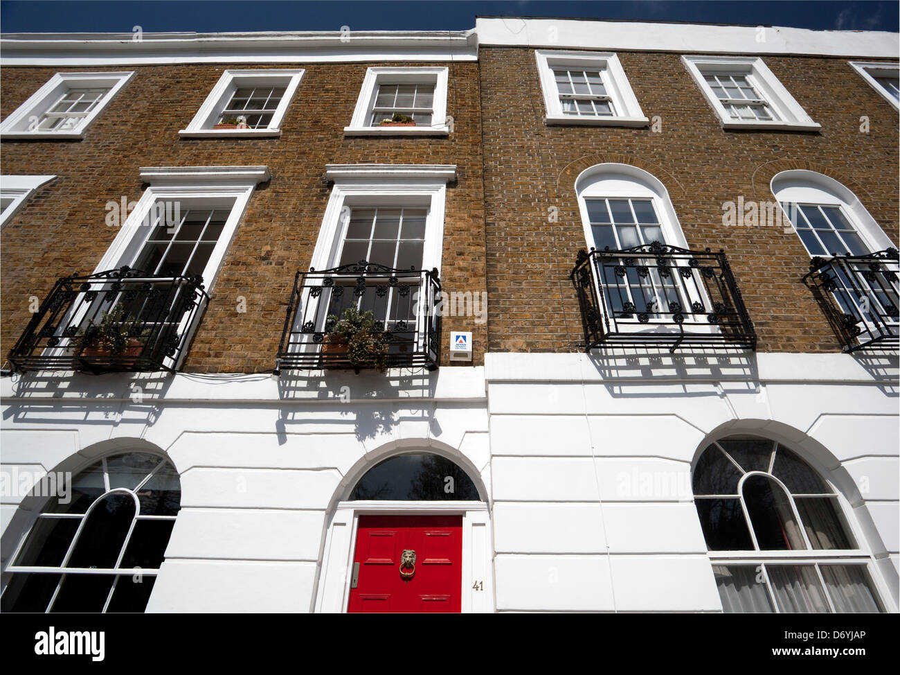 Georgian terraced houses in upmarket square in Islington, London Stock ...
