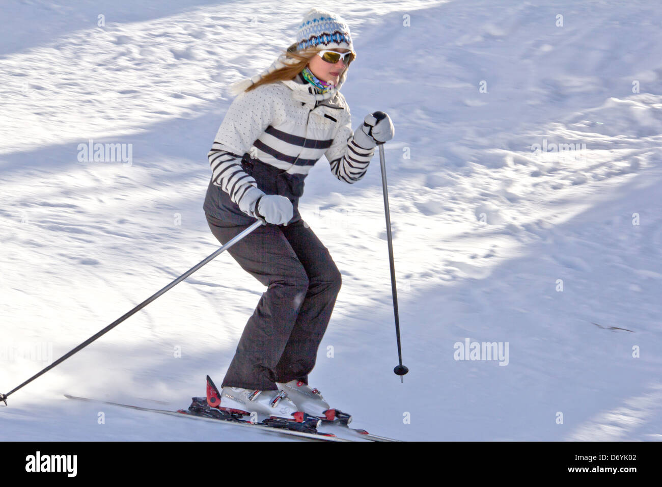 women athletes skiing in mountains Stock Photo - Alamy