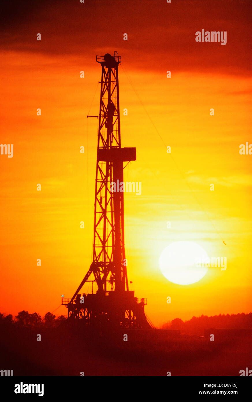 Silhouette of an oil drilling rig at sunset, Texas, USA Stock Photo - Alamy