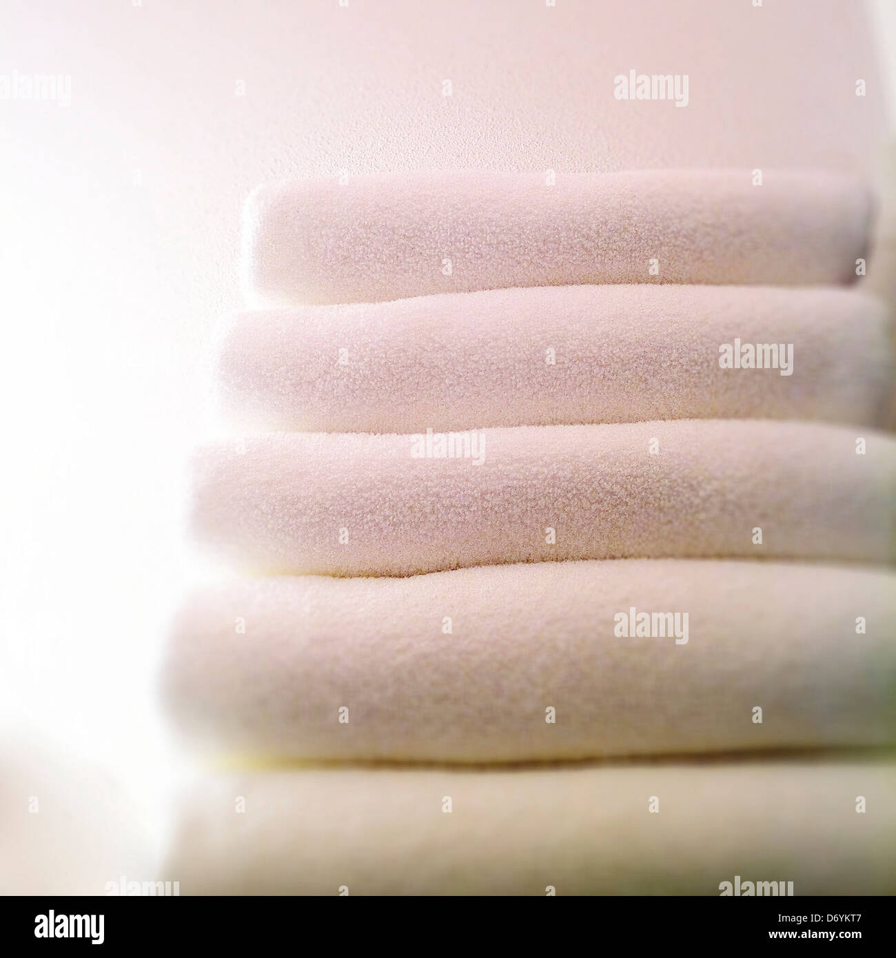 Stack of folded white towels Stock Photo - Alamy