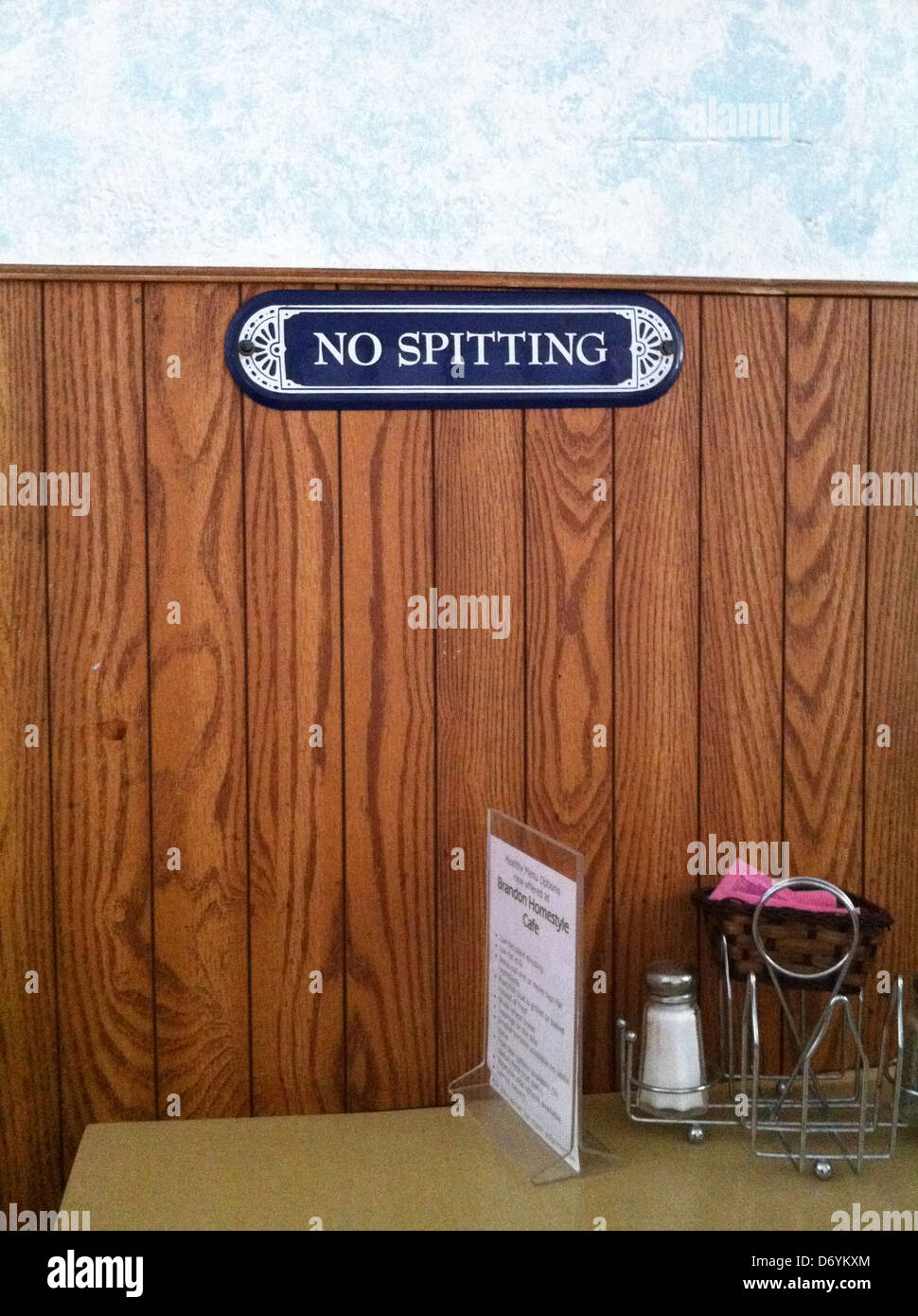 No spitting sign in restaurant Stock Photo - Alamy