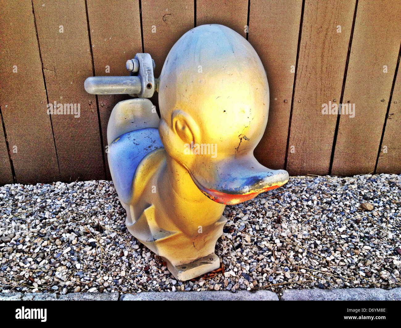 Duck statue in gravel path Stock Photo - Alamy