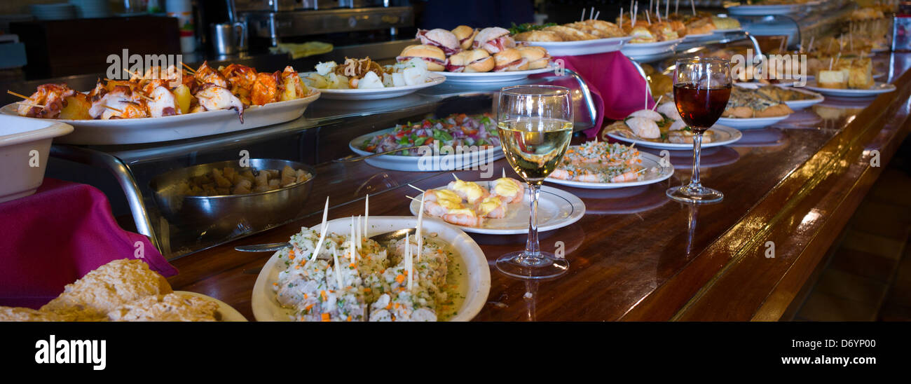 Tapas raciones in Taberna La Cierbanata bar in tourist resort of Castro ...