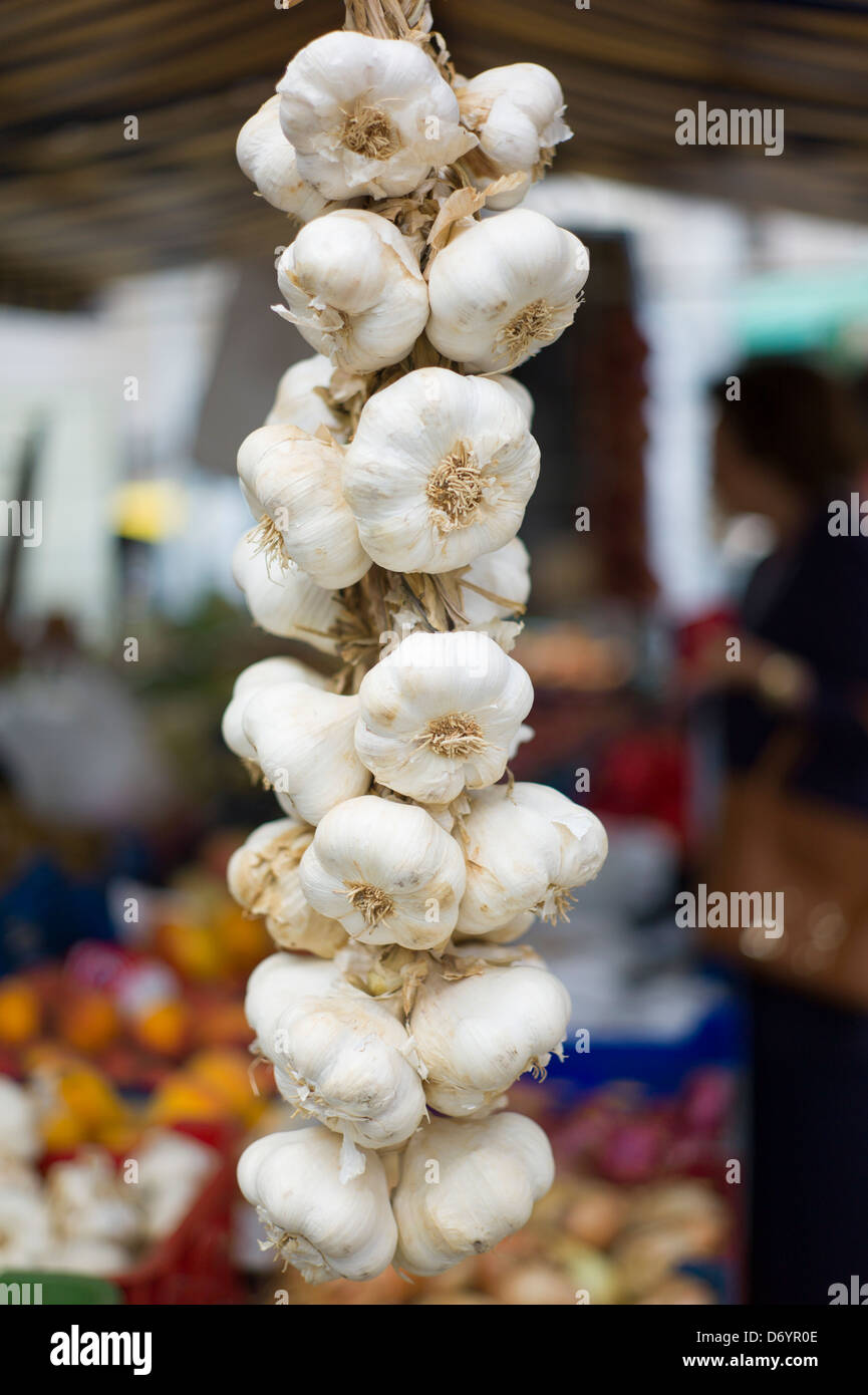 Garlic plait, Allium sativum, vitamin-rich vegetable, on sale in food ...