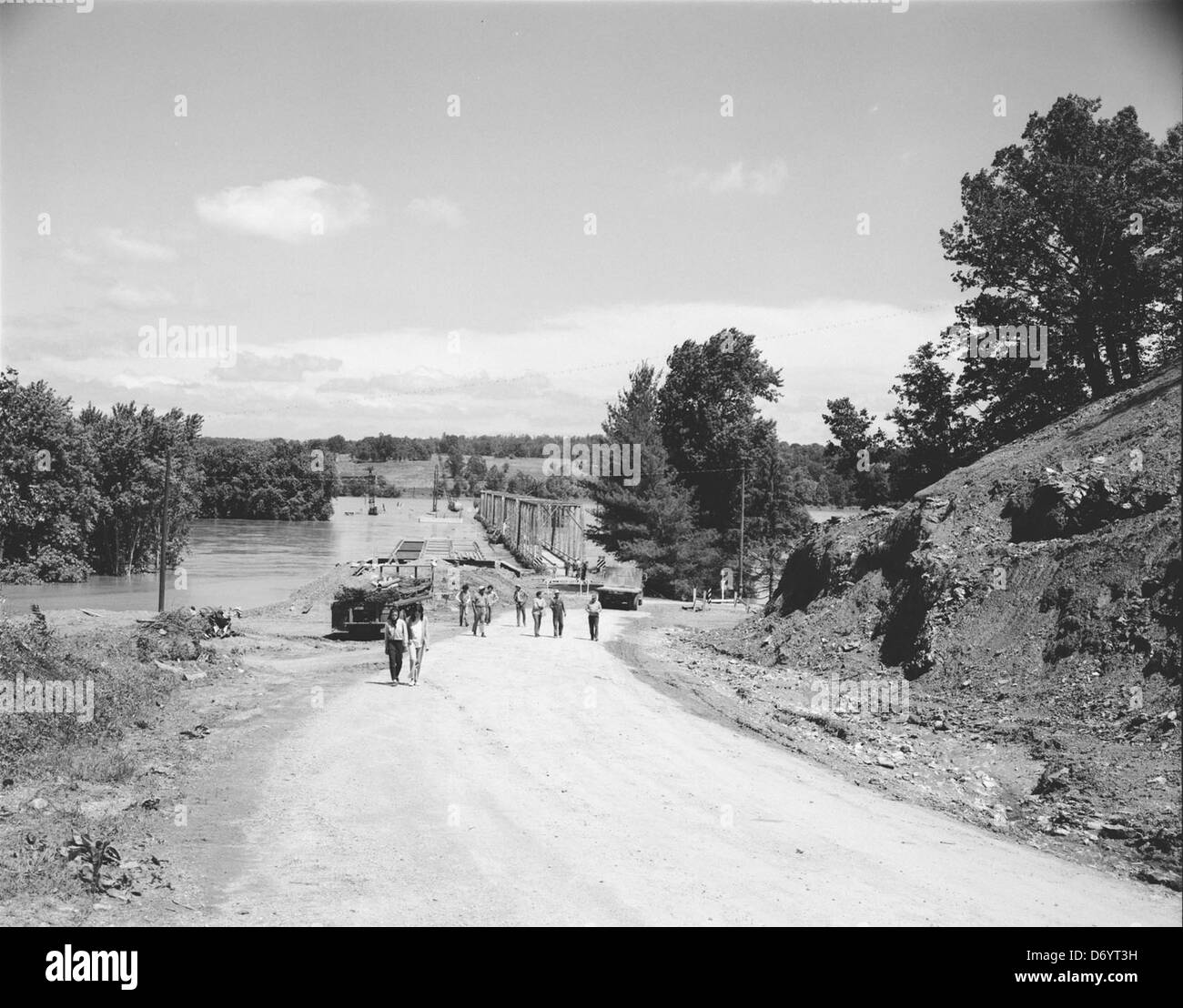 This photograph shows the reconstruction of a bridge in Wingina ...