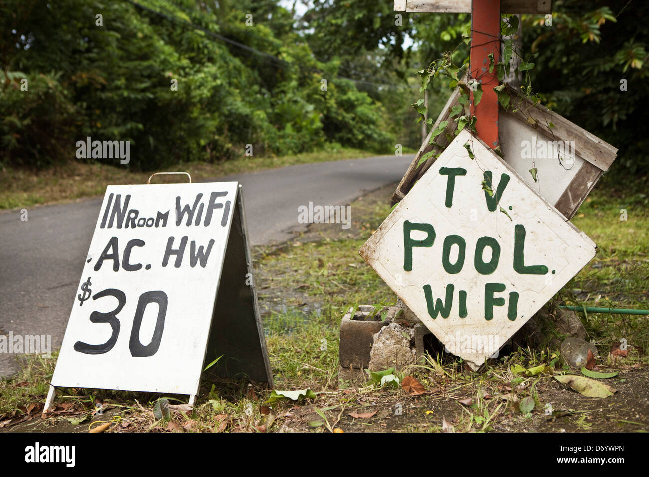 Hotel signs at the roadside, Costa Rica Stock Photo - Alamy