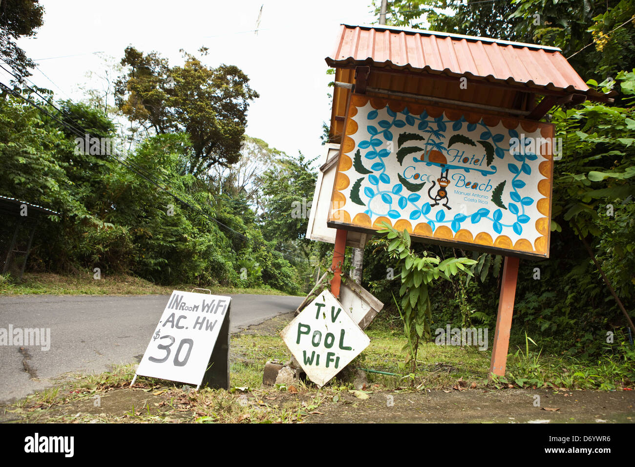 Hotel signs at the roadside, Costa Rica Stock Photo - Alamy