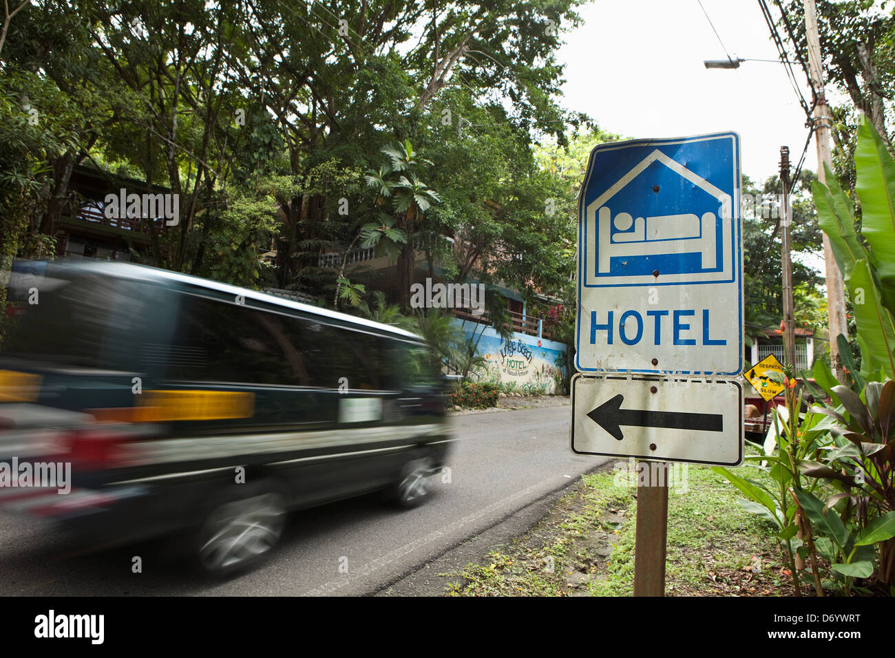 Hotel sign showing vehicles where to stop, Costa Rica Stock Photo - Alamy