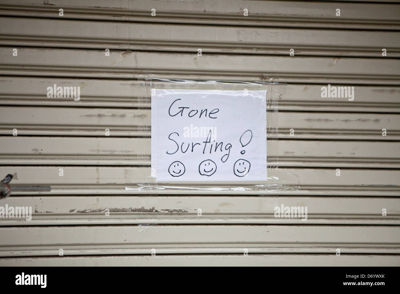 Hand written Gone Surfing sign, Costa Rica Stock Photo - Alamy