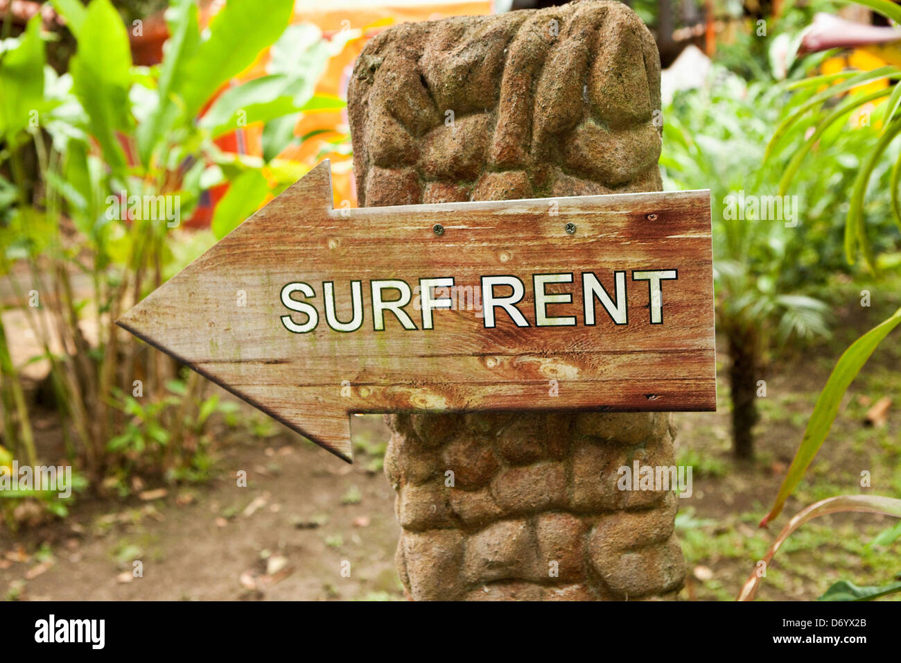Wooden surf rent arrow sign, Costa Rica Stock Photo - Alamy