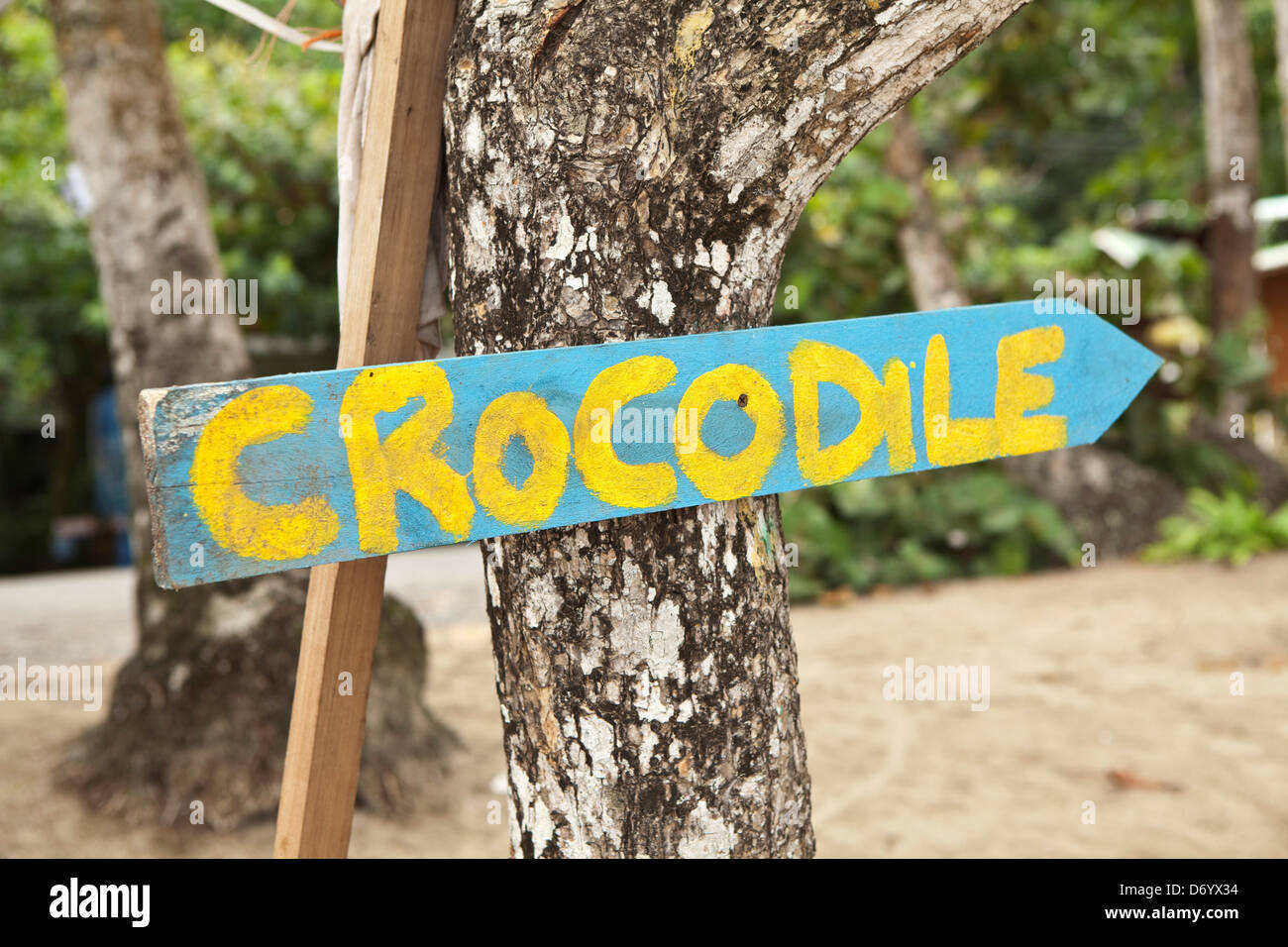 Wooden crocodile sign, Costa Rica Stock Photo - Alamy