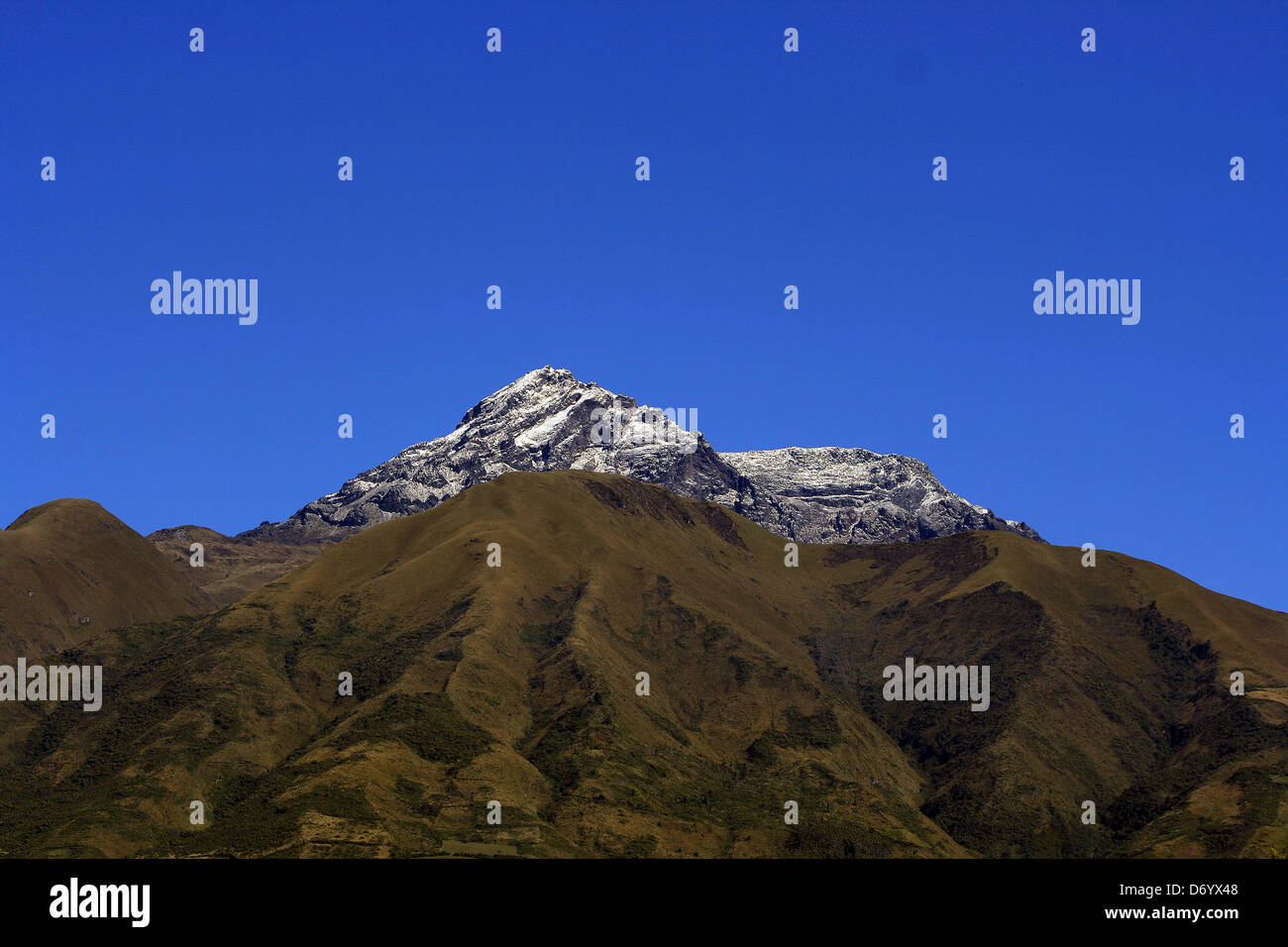 The snow covered peak of Mount Cotacachi as seen from Cotacachi ...