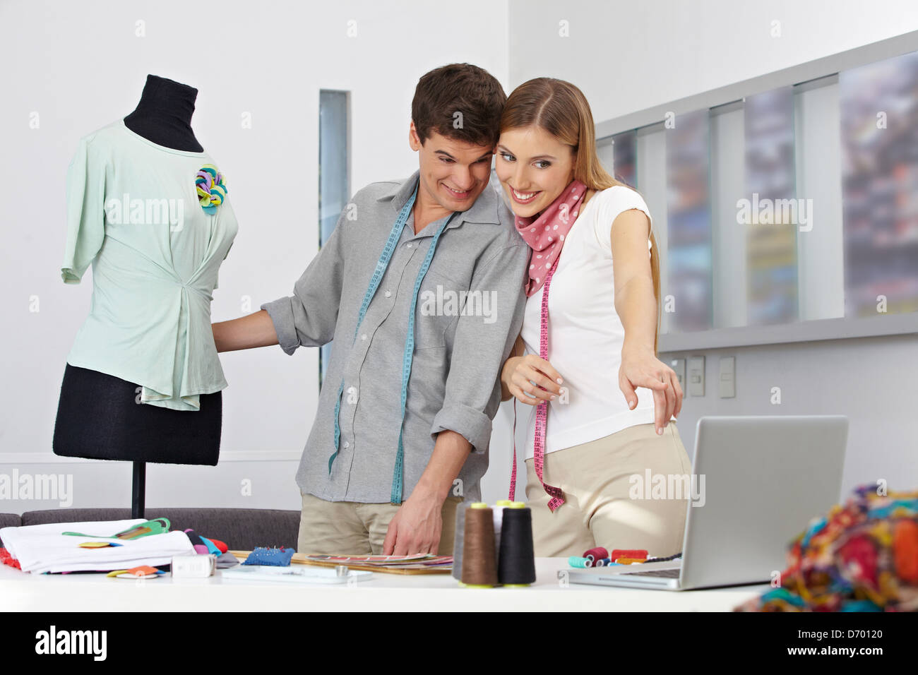 Man and woman studiyng fashion design as online class Stock Photo - Alamy Man and woman studiyng fashion design as online class Stock Photo - Alamy