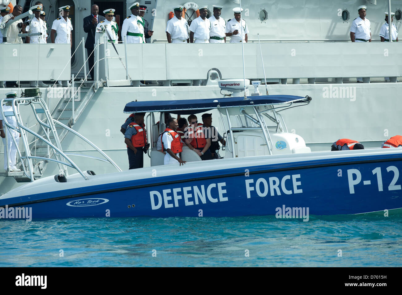 Britain's Prince Harry takes a ride in a Royal Bahamas Defence Force ...