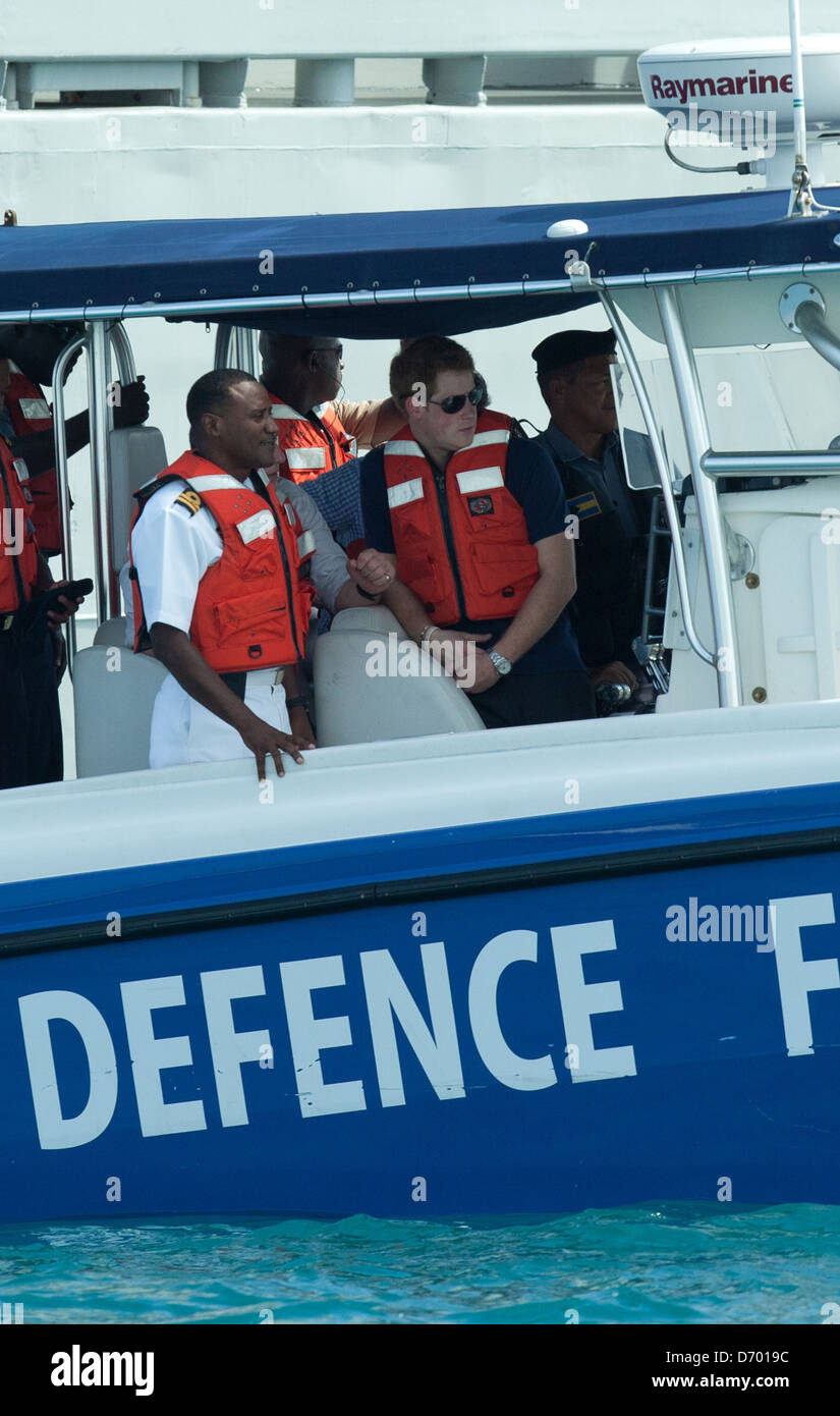 Britain's Prince Harry takes a ride in a Royal Bahamas Defence Force ...